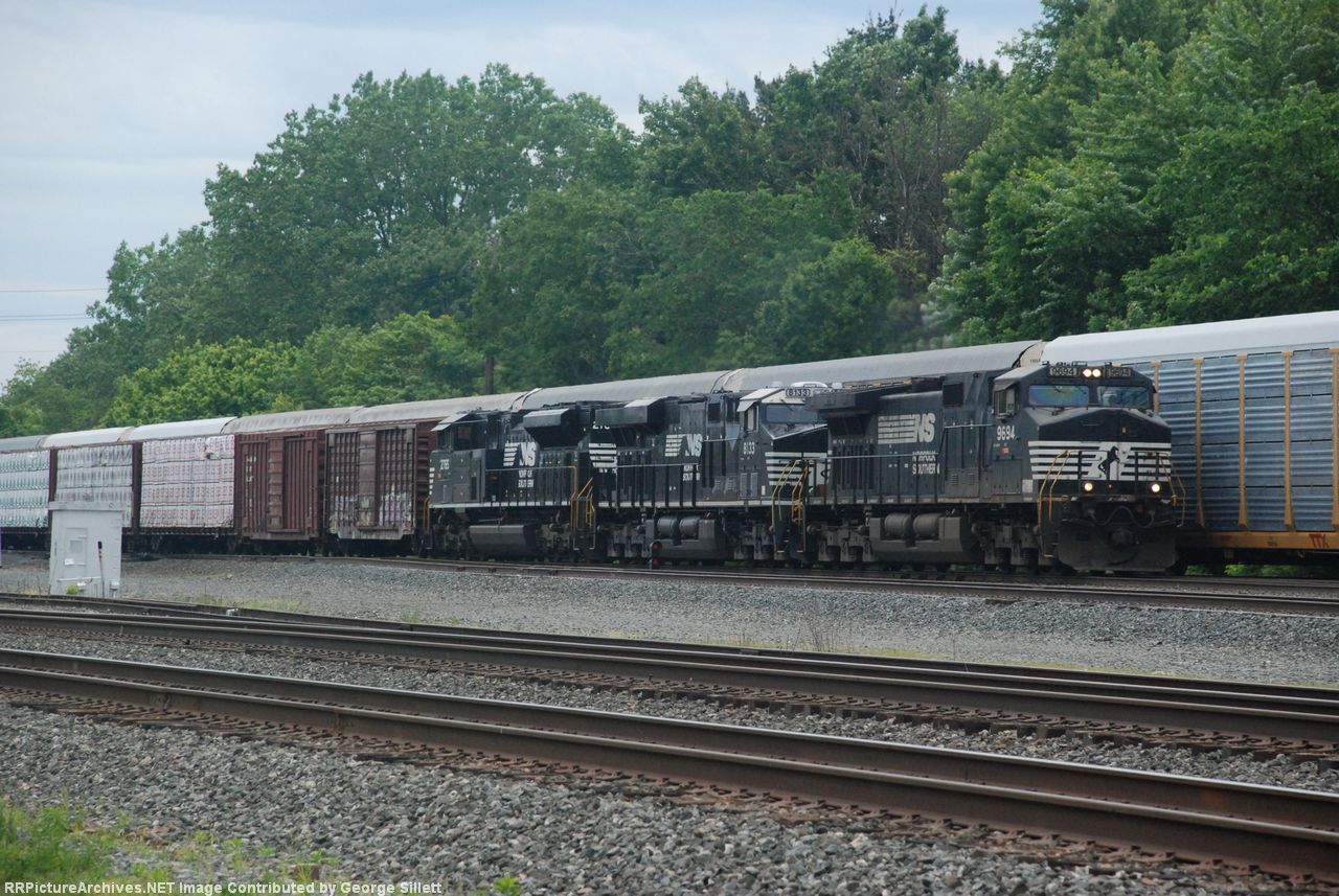 NS 9694 passes the other train in a meet.